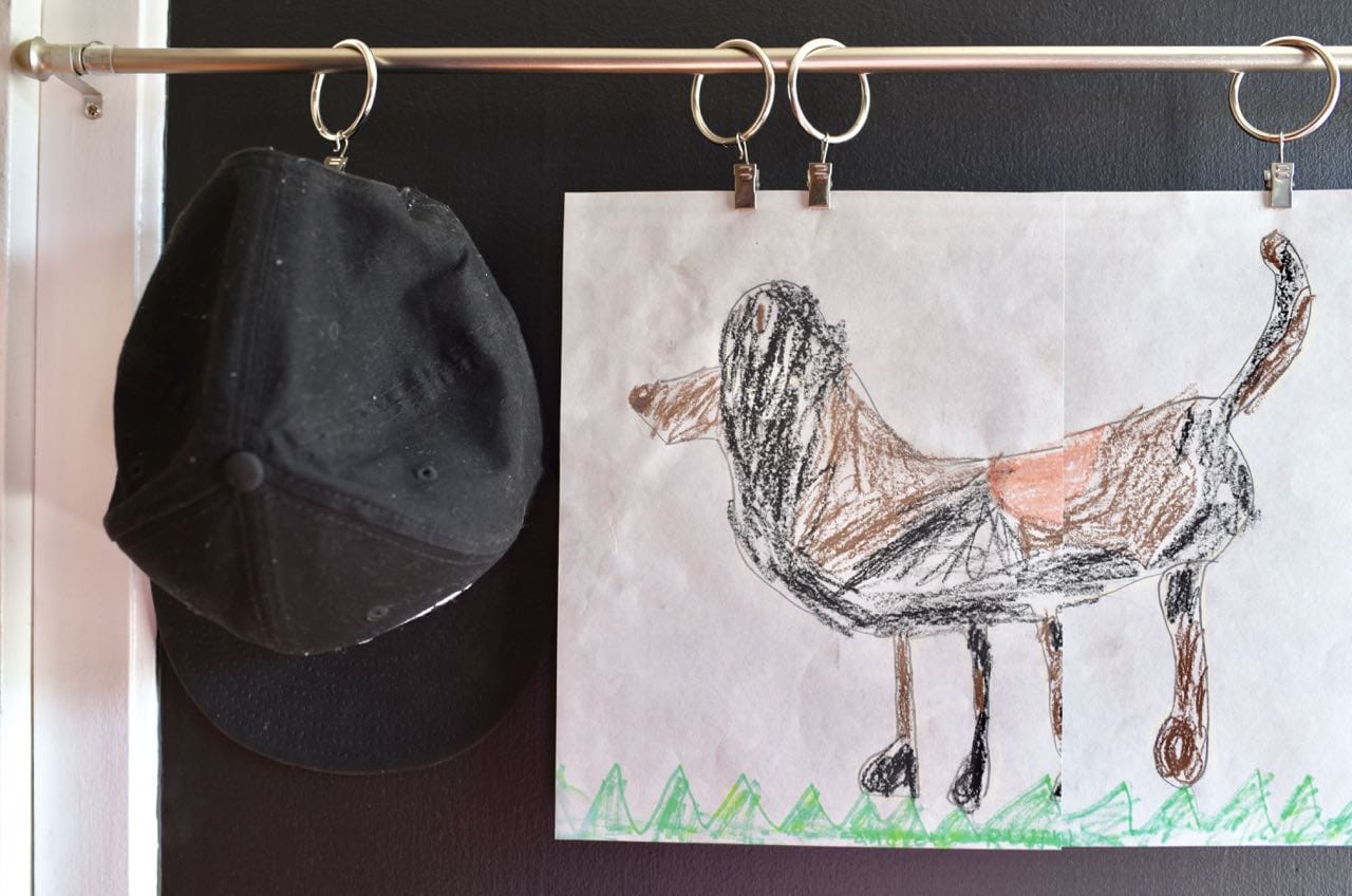 Kids closet makeover with hanging artwork display rod - Make Life Lovely